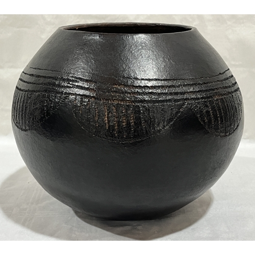 African Zulu sorghum beer brewing and serving pot or ukhamba, coil ...
