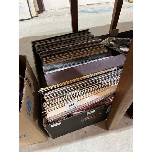 A collection of vinyl records & tapes