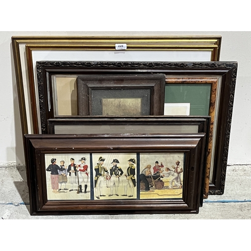 A collection of framed prints.