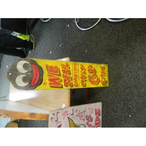 Wooden hand painted advertising sign.