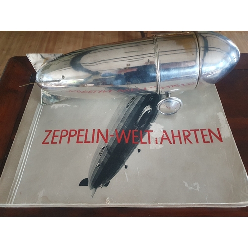 Art Deco Chrome Zeppelin cocktail shaker. Size is 13 inches in length ...