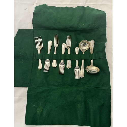 Silver: A set of twelve Jesmond pattern forks in a cutlery roll ...