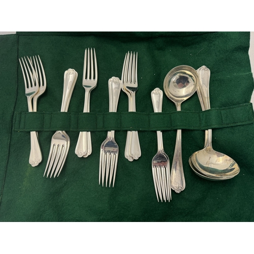 Silver: A set of twelve Jesmond pattern forks in a cutlery roll ...