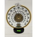 Scientific: A round Perspex Jaeger barometer with subsidiary ...