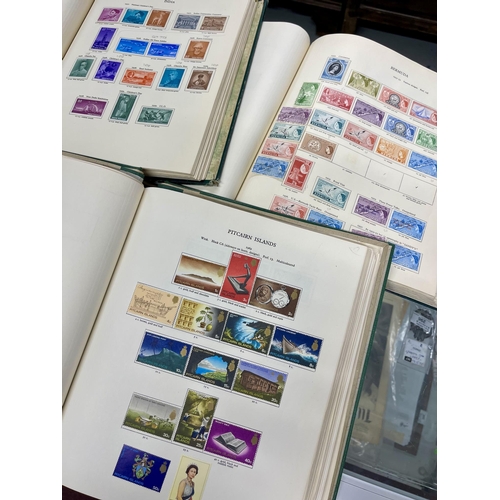 Stamps: Stamps: Commonwealth, three New Age stamp albums containing ...