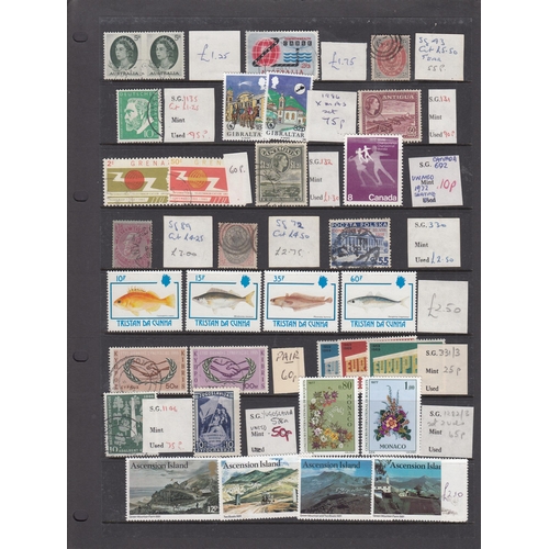 An ex-dealers counter display containing 40+ stock sheets of mint and ...