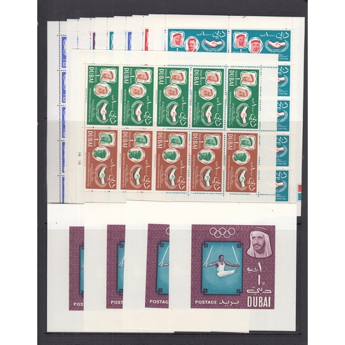 Dubai - A fine MNH collection of Dubai stamps on stock sheets in album ...