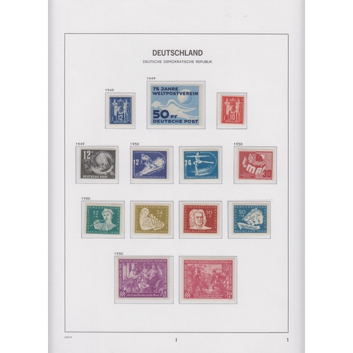 A mint stamp collection on pre-printed album pages from 1949-65 ...