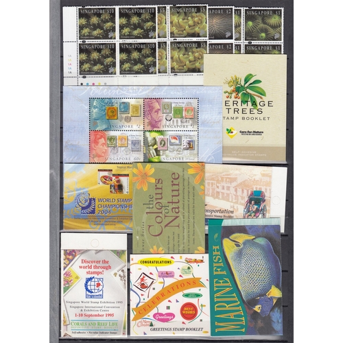 A collection of mint and used Singapore stamps, covers and packs from ...