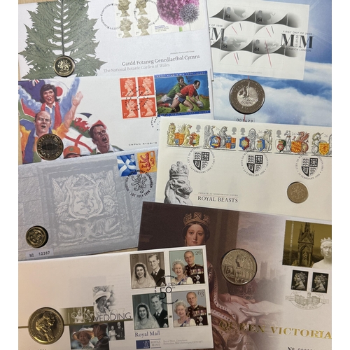 A duplicated collection of x200 UK QEII Coin Covers from 1997 to 2001 ...