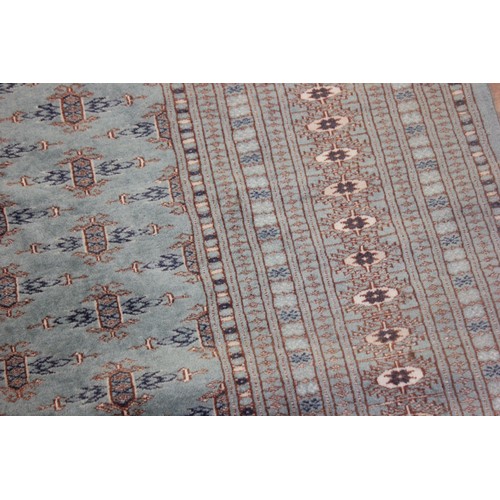 A Bokhara rug, pale green ground with wide multi banded border, 130cm x ...