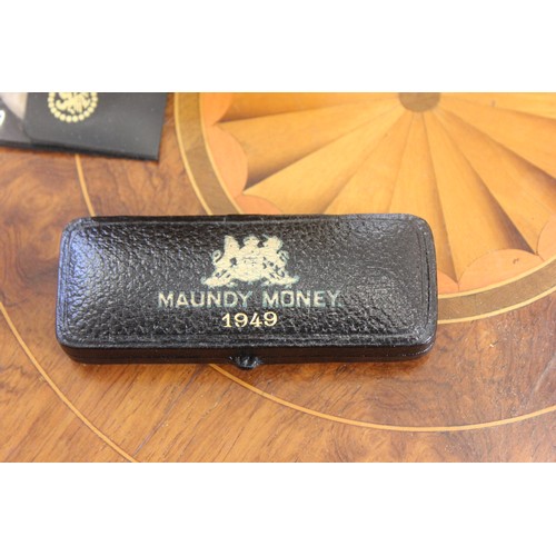A set of George VI 1949 maundy money in lined case, together with a ...