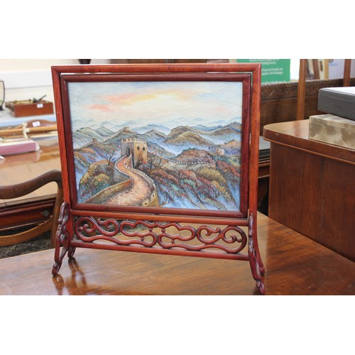 A 20th century Chinese decorative wooden table screen with embroidered ...