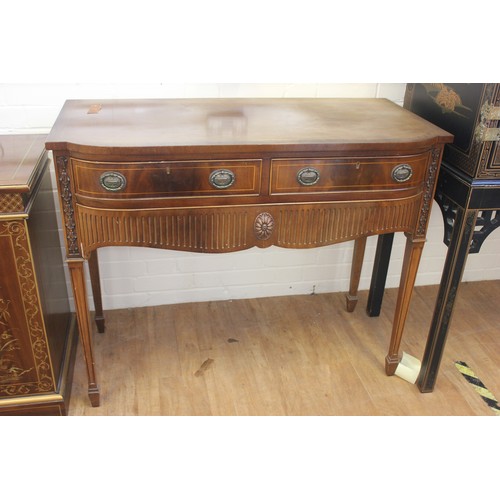 A small reproduction mahogany bow fronted sideboard fitted three draws ...
