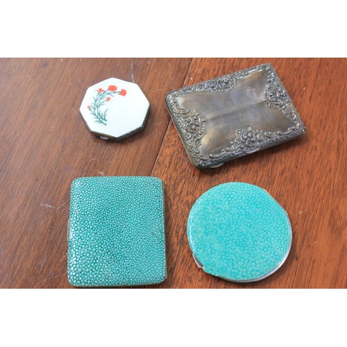 A shagreen cigarette case, a ditto compact, a small silver and ...