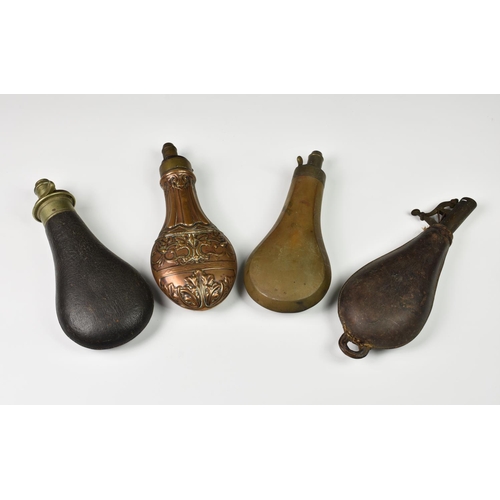 A collection of four antique powder flasks, comprising of a SYKES ...
