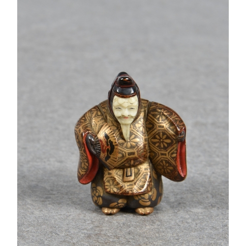 A Japanese lacquered wood netsuke of a noh actorprobably 19th / early ...
