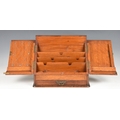 A late 19th / early 20th century oak desk tidy, with two fold out doors ...