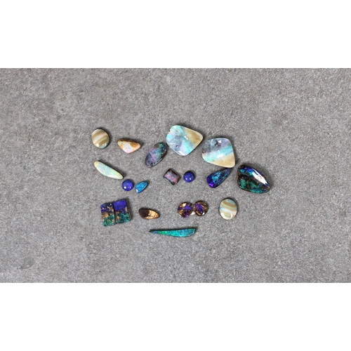 A collection of loose boulder opals various shapes and sizes, the ...