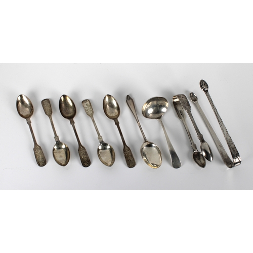 A collection of silver spoons and sugar tongs in various forms,, to ...