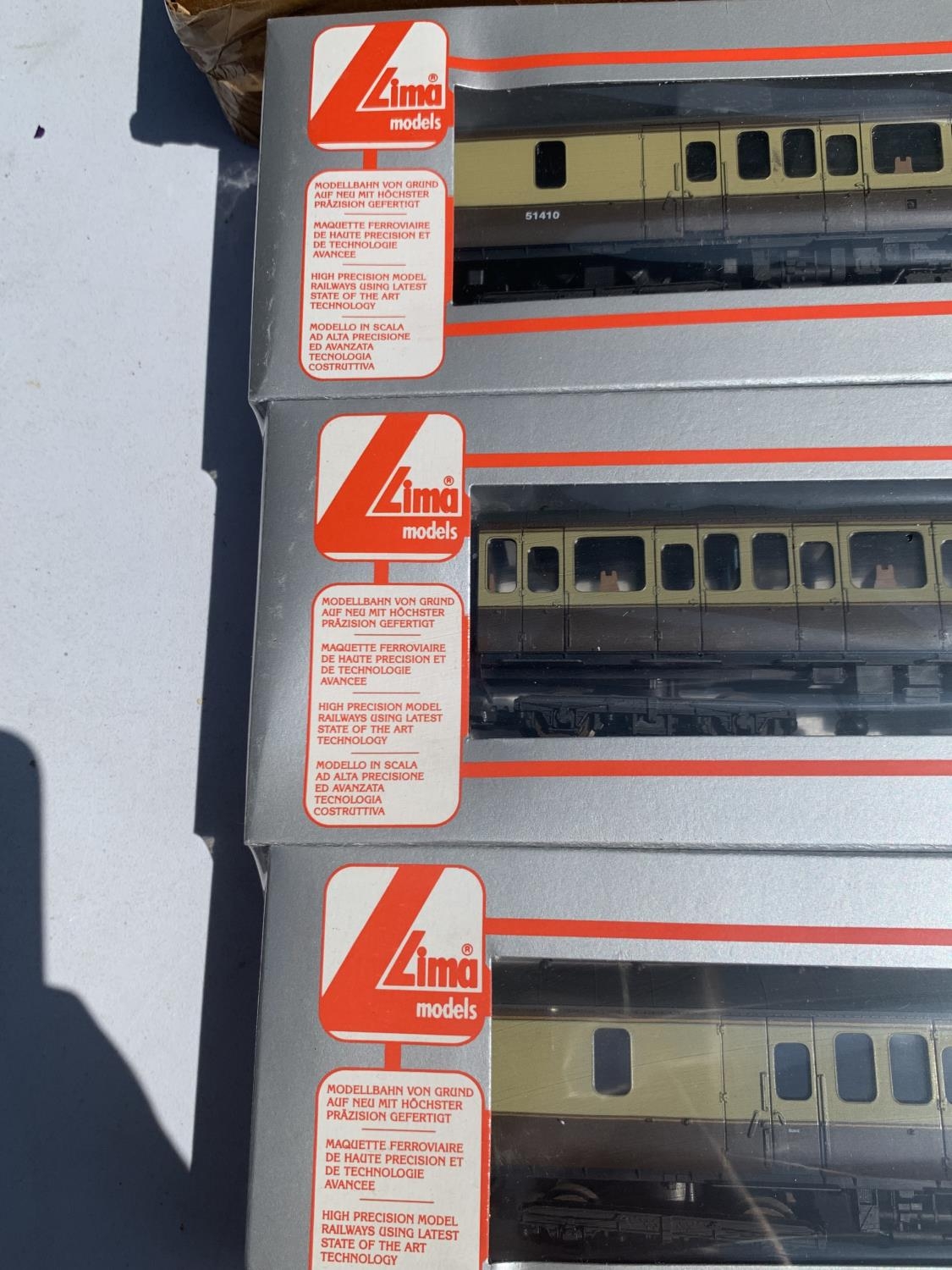 3 New and Boxed Lima Trains