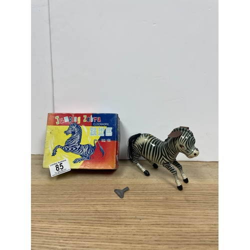 Vintage Jumping Zebra Clockwork Toy in Original Packaging.