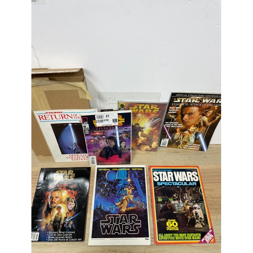 Collection of Star Wars magazines and official collector editions.