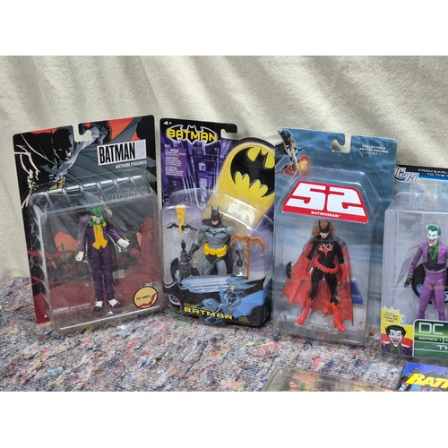 A Collection of Batman Action Figures and Collectables, including ...