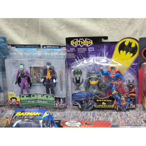 A Collection of Batman Action Figures and Collectables, including ...