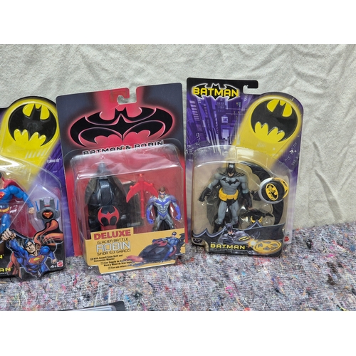 A Collection of Batman Action Figures and Collectables, including ...