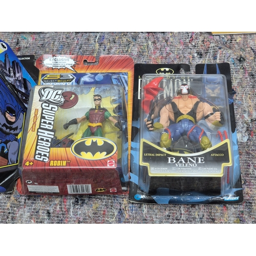 A Collection of Batman Action Figures and Collectables, including ...