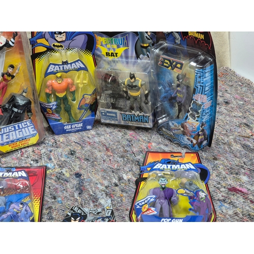 A Collection of Batman Action Figures and Vehicles, to include items ...