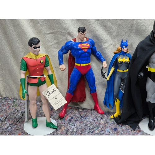 A Collection of DC Action Figures to include Batman, Robin, Superman ...