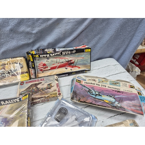 Collection of vintage aircraft model kits, featuring brands like Solido ...