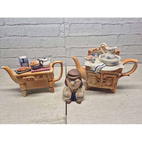 Two Cardew Designs Teapots together with a Tetley Moneybox
