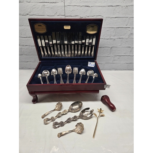 A Canteen of Viners Silver Plated Cutlery together with some extras