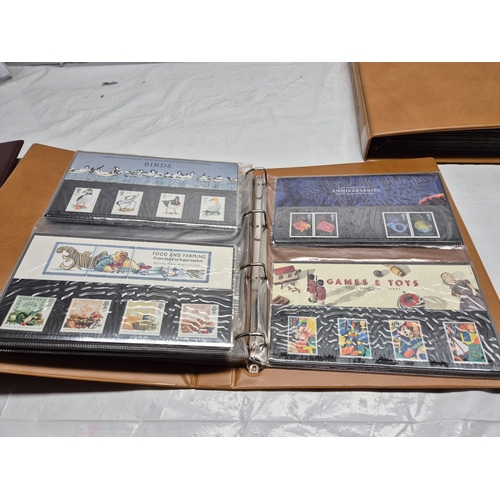 Four Albums of UK Royal Mail Stamp Presentation Packs (approx 180 packs ...