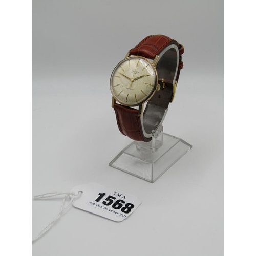 9ct GOLD CASED ENVOY GENTS WATCH ON A BROWN LEATHER STRAP, PRESENTATION ...