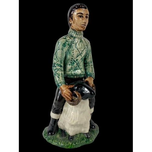 2 Coll Pottery Isle of Lewis figures. 23.5cm.