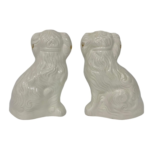 A pair of Beswick pottery dogs. 20cm.