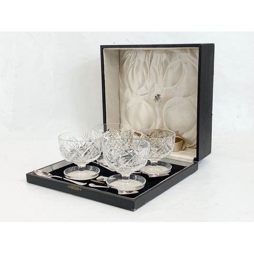 4 crystal dessert bowls with silver plated spoons by Dublin maker.