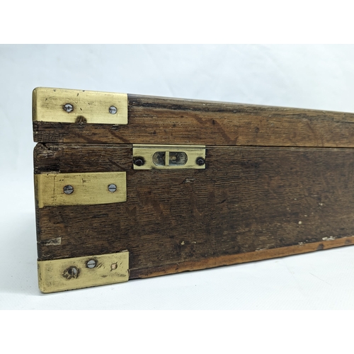 A Victorian campaign brass bound military gun box. London maker. 90x24x14cm
