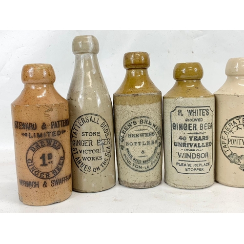 A quantity of vintage stone jars