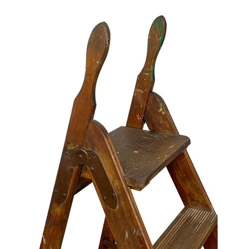 An Edwardian pine step ladder. 141cm closed.
