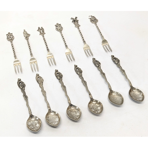 A set of 6 Japanese silver spoons stamped Nagasaki, 84g, with 6 ornate ...
