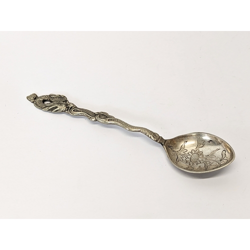 A set of 6 Japanese silver spoons stamped Nagasaki, 84g, with 6 ornate ...