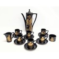 A 15 piece Portmeirion pottery "Phoenix" by John Cuffley coffee set.