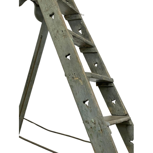 Early 20th century wooden ladders. Circa 1920. 157cm closed.