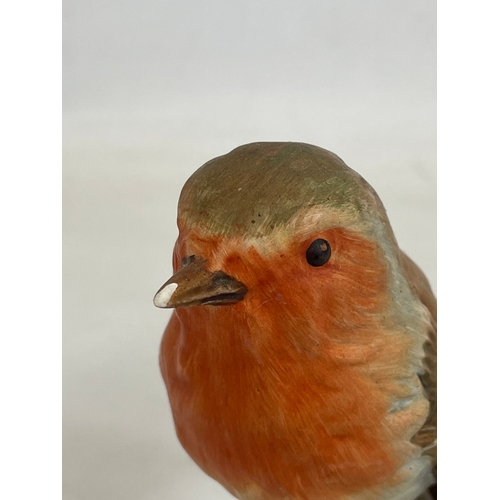4 pieces of pottery. A Poole pottery ashtray 19cm, a Goebel bird 12cm ...