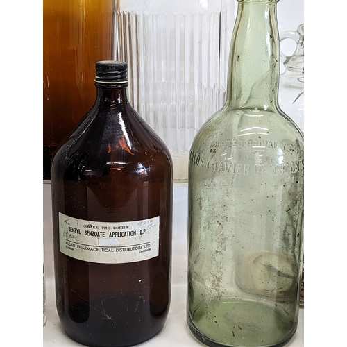 A quantity of vintage glass bottles, etc.